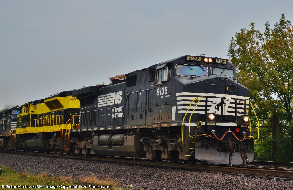 NS 9136 leads the Yellow Jacket by the tail.
